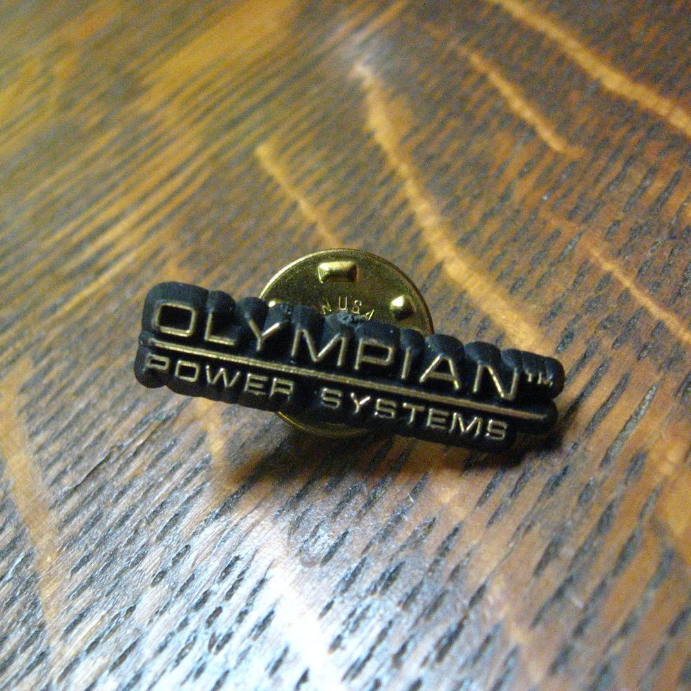 Olympian Power Systems Vintage Lapel Pin - Gem